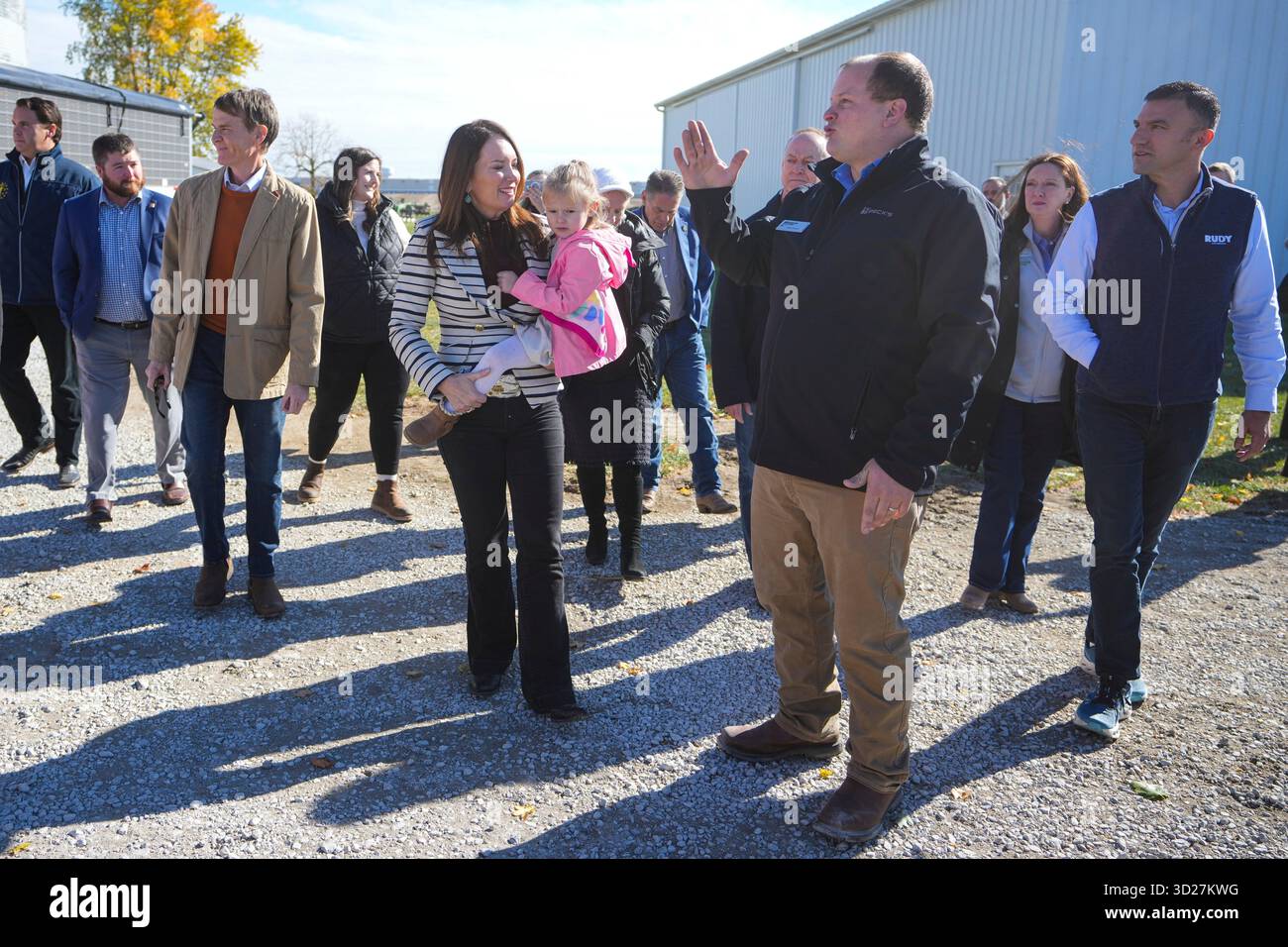 U.S. Secretary of Agriculture Brooke L. Rollins, center, tours a farm ...