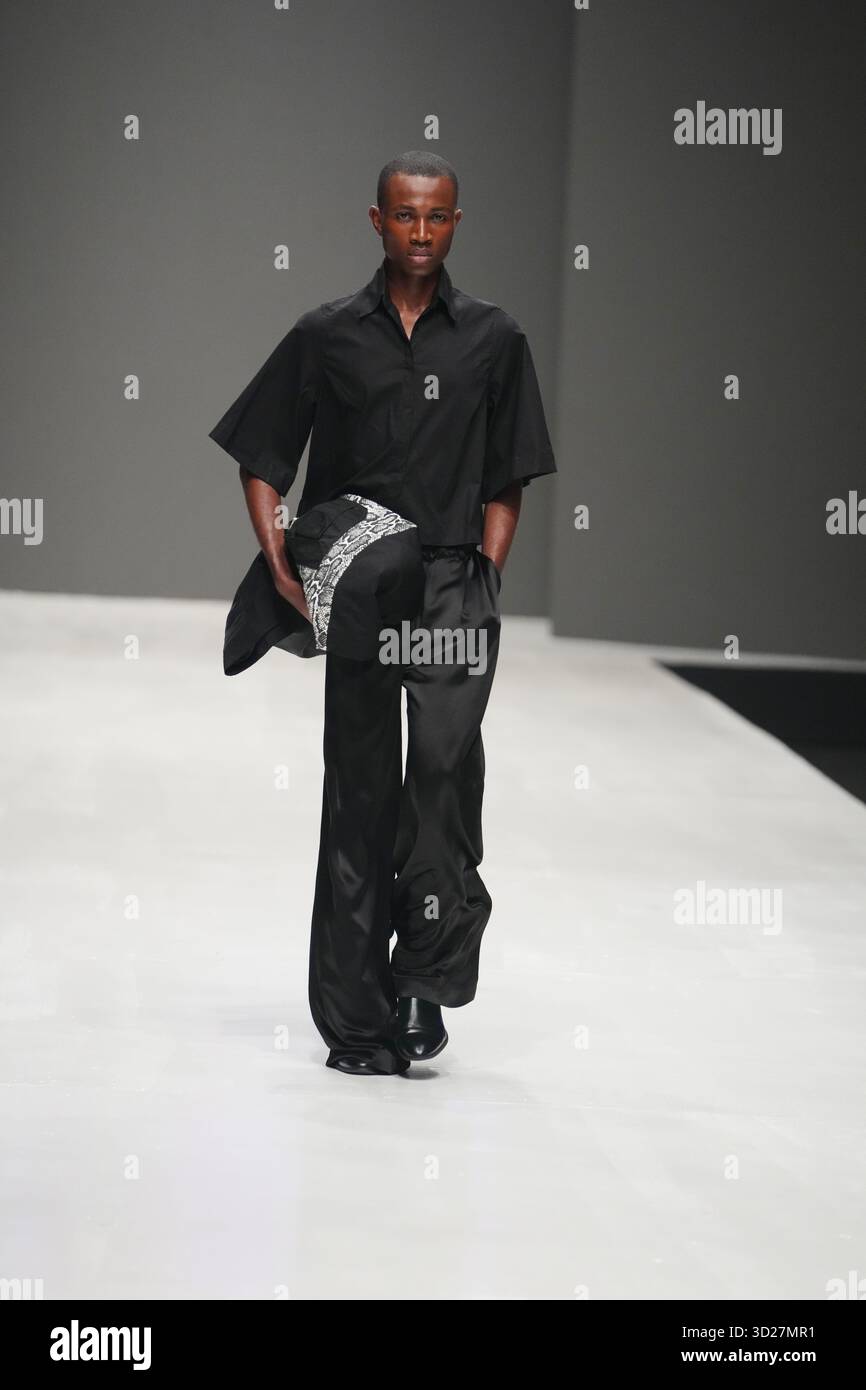 A model wears a creation by designer HAWA PARIS during the Lagos ...