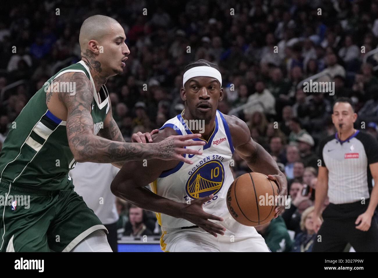 Golden State Warriors' Jimmy Butler III tries to get past Milwaukee ...