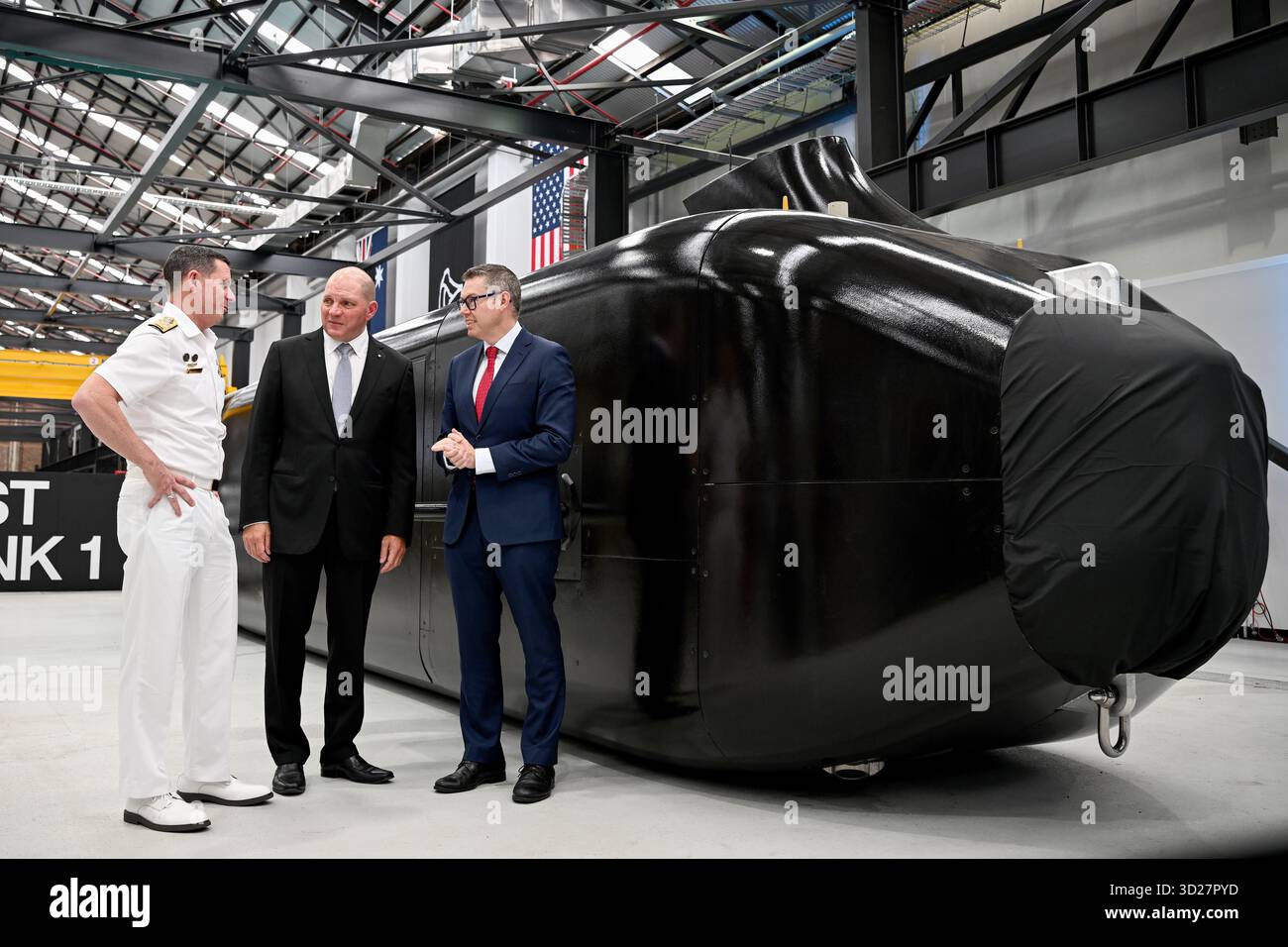 (L-R) Chief of the Royal Australian Navy Vice Admiral Mark Hammond, CEO ...