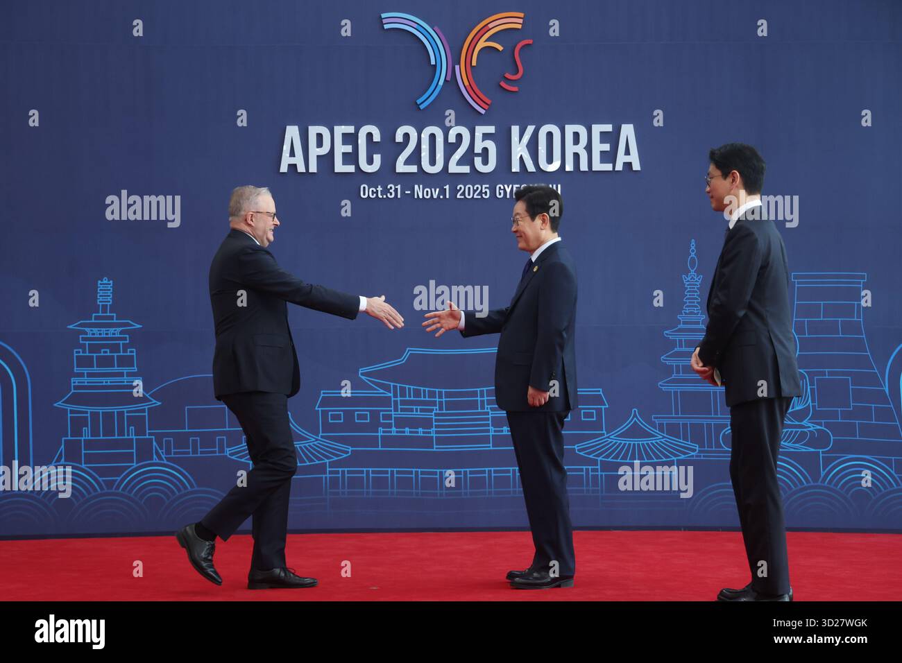 South Korean President Lee Jae Myung, center, welcomes Australian Prime ...