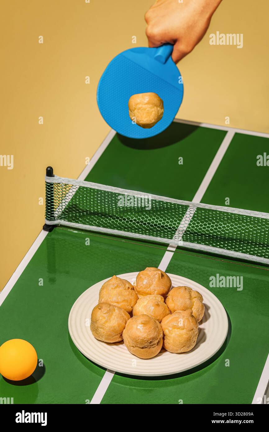 Cream puffs ping pong hi-res stock photography and images - Alamy