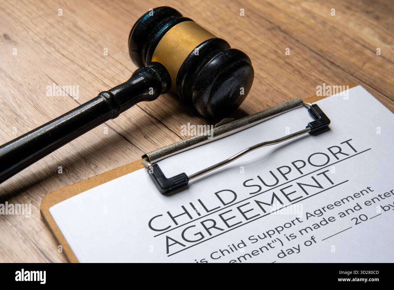 A gavel on a child support agreement document. Legal concept Stock ...