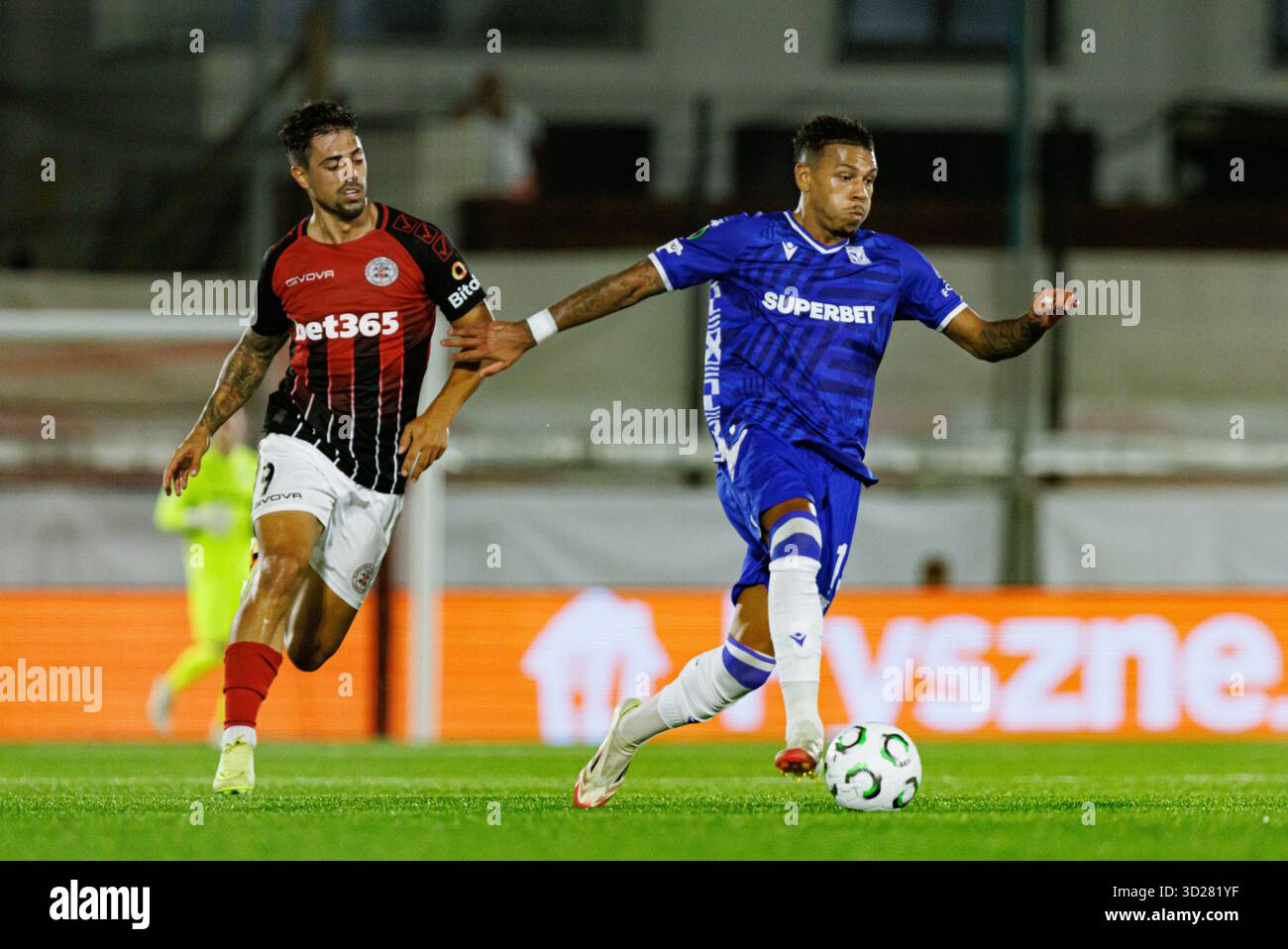 Kike Gomez and Bryan Fiabema seen during UEFA Conference League league ...