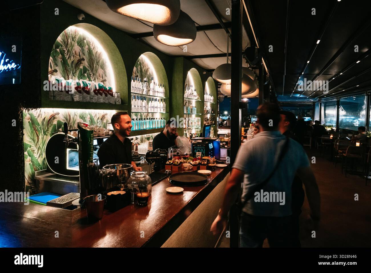 Counter at the E7 UpperView rooftop bar with Greek bartender in the ...