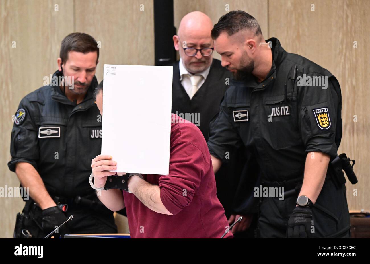 Mannheim, Germany. 31st Oct, 2025. The defendant in a murder trial ...