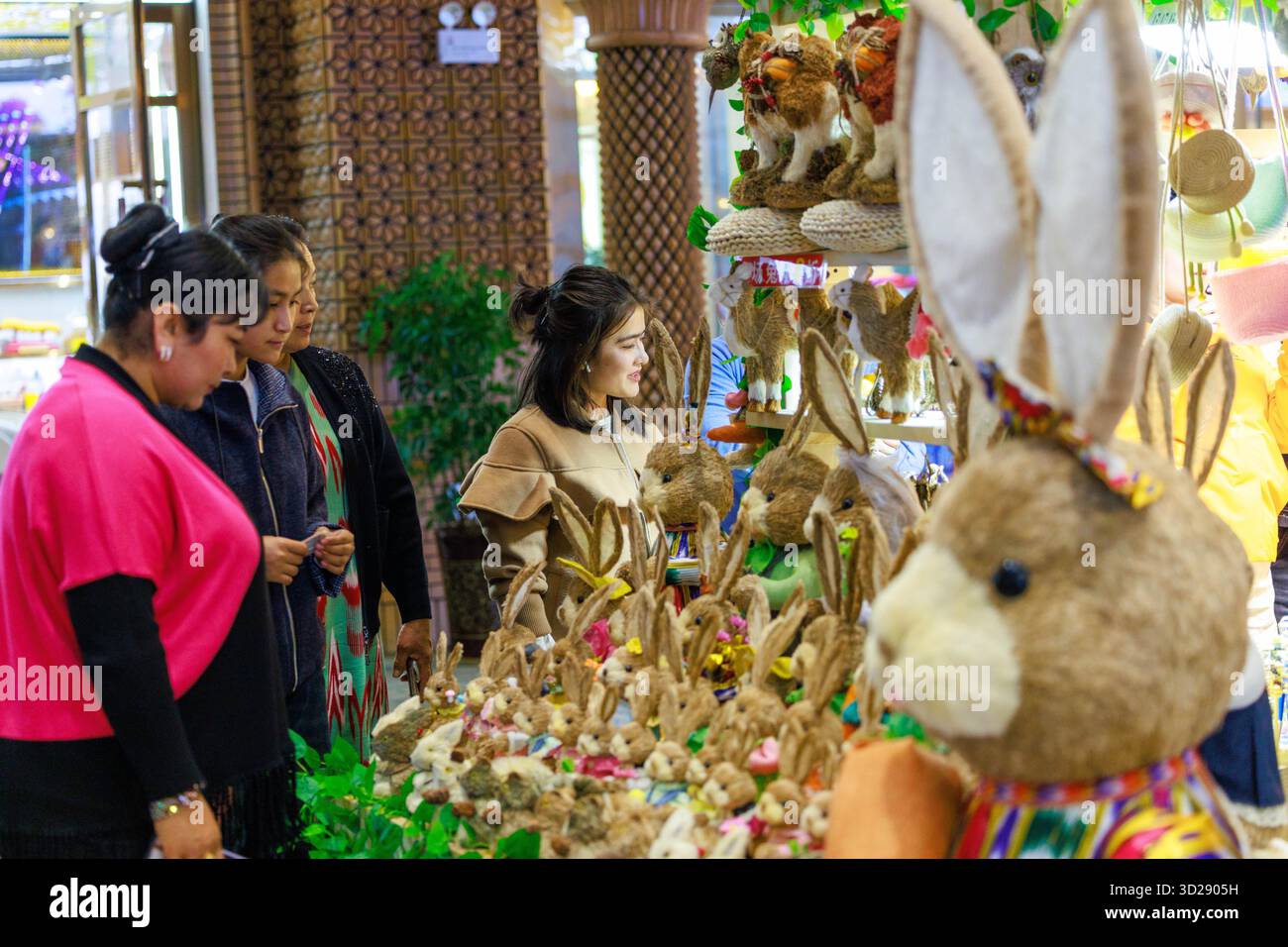 Tourists visit the Grand Bazaar in Urumqi City, northwest China's ...
