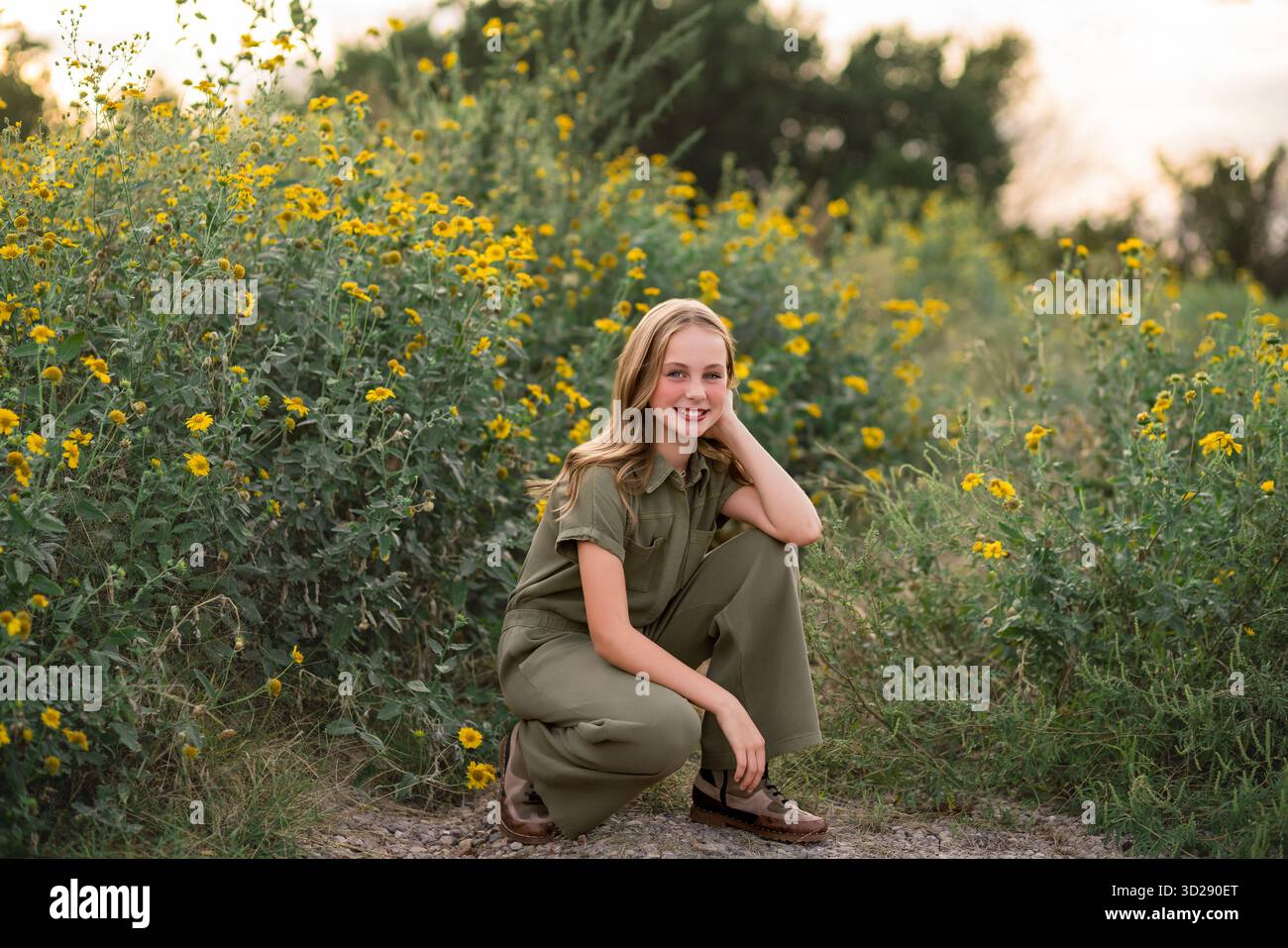 A Generation Alpha Girl Poses in a Field of Wildflowers Stock Photo - Alamy