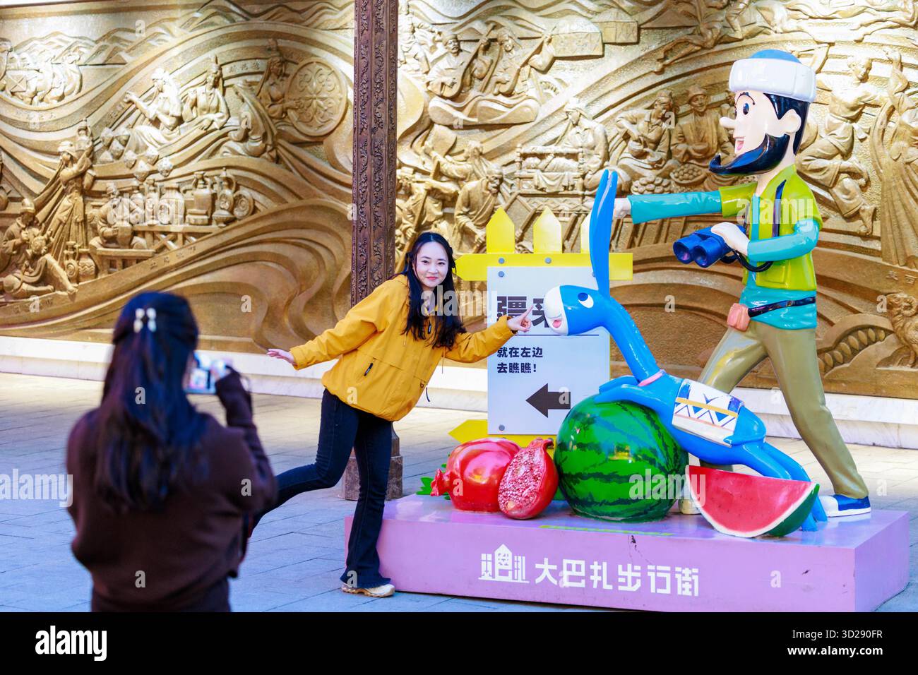Tourists visit the Grand Bazaar in Urumqi City, northwest China's ...