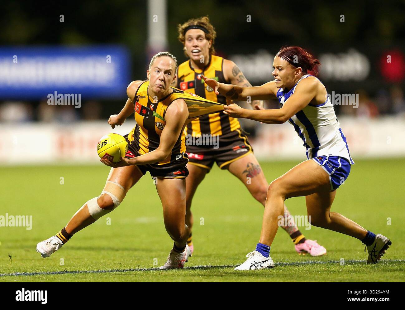 Jasmine Fleming of the Hawks handballs during the AFLW Round 12 match ...