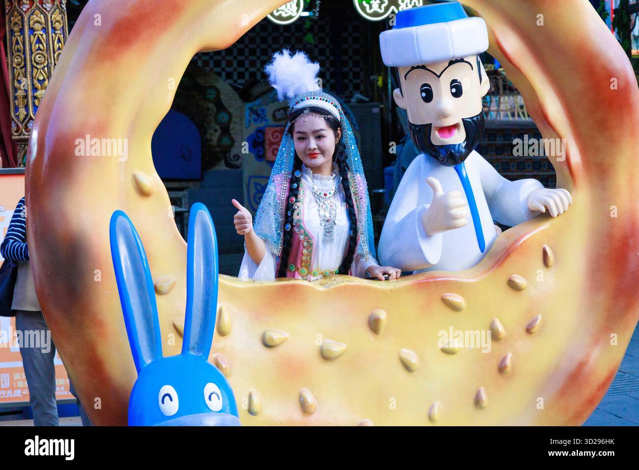 Tourists visit the Grand Bazaar in Urumqi City, northwest China's ...