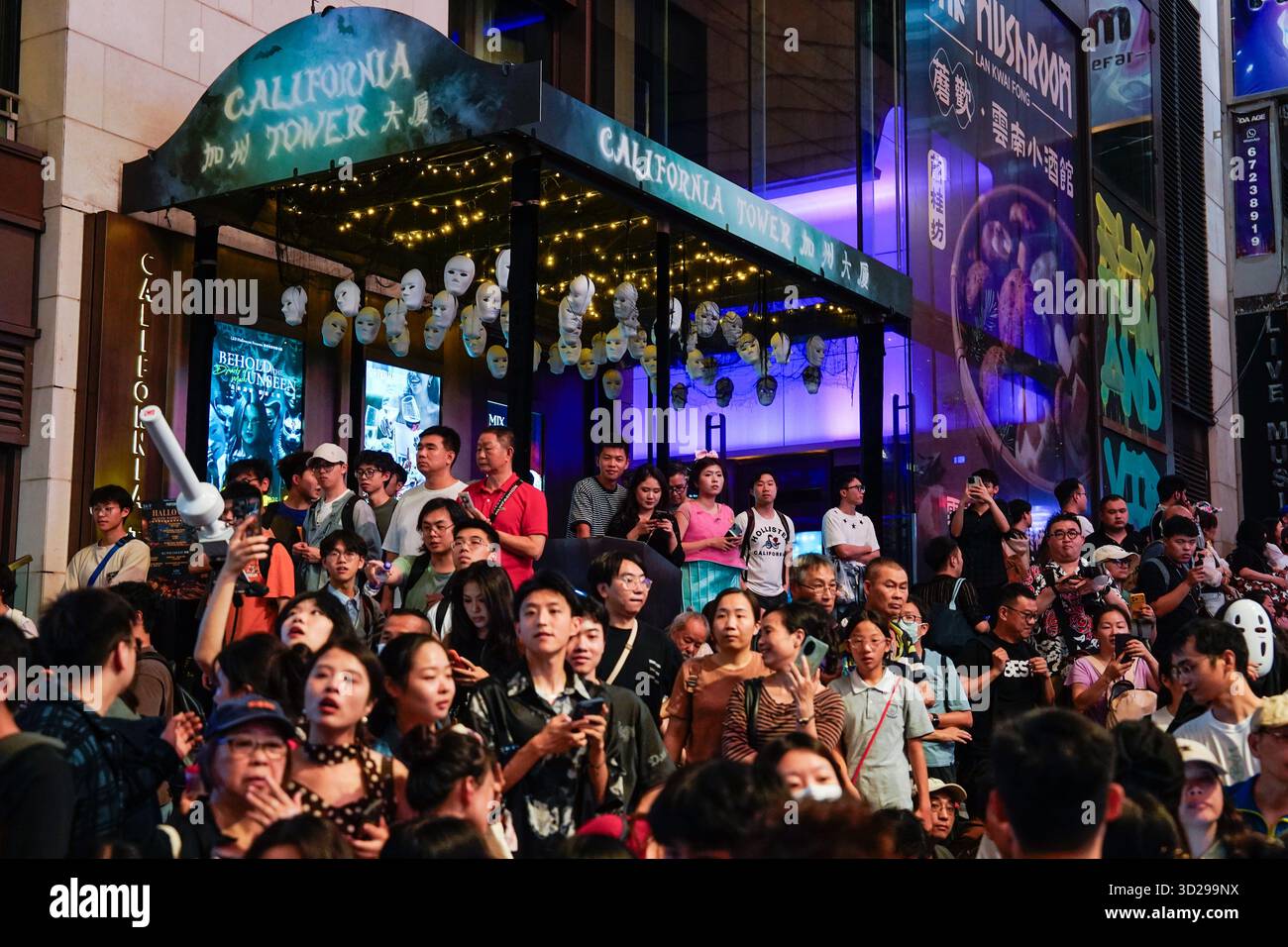 People gathering in Lan Kwai Fong a popular bar district in the city to ...