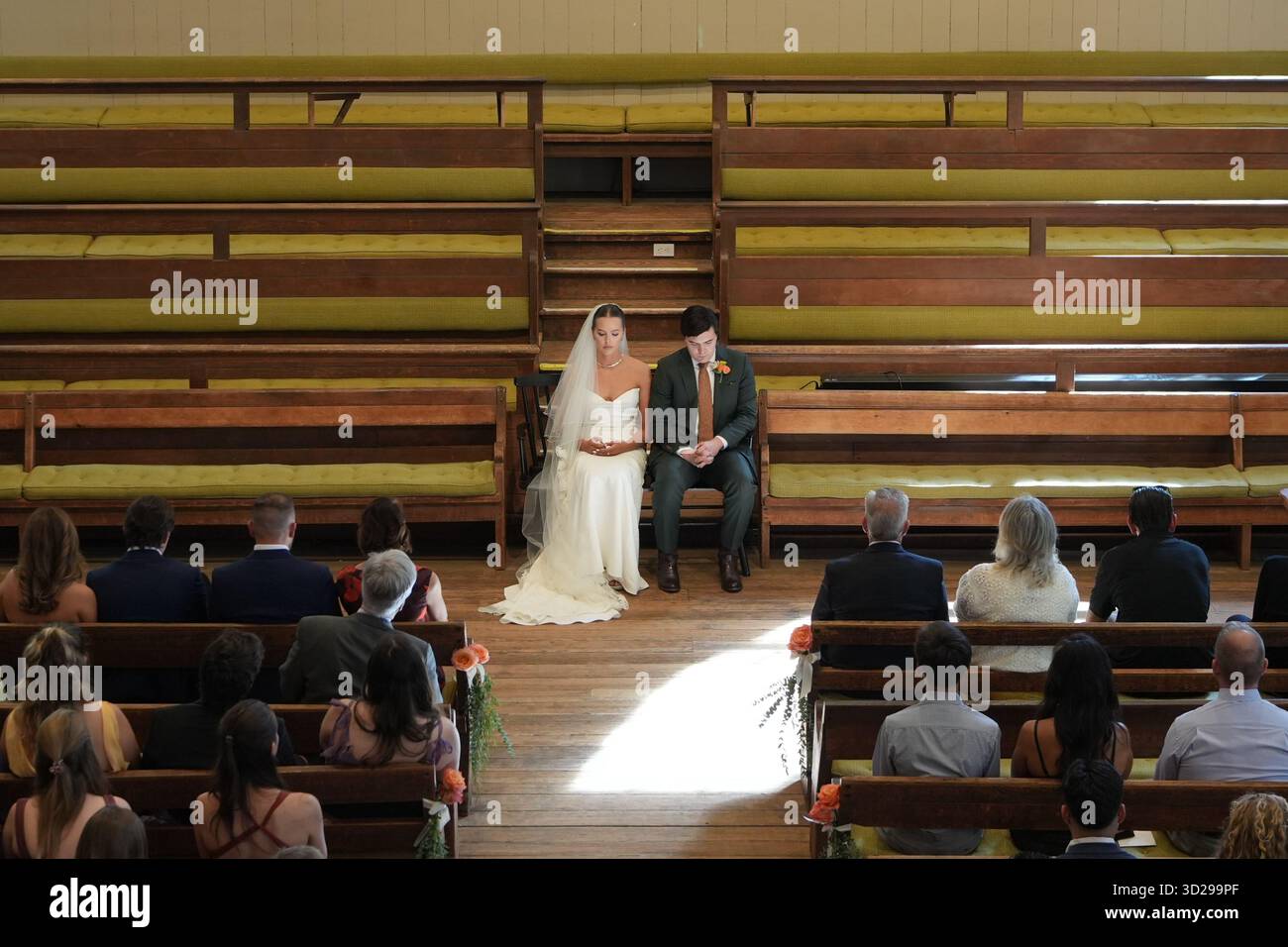 Emily Philbrook and Benjamin Barger hold a moment of silence during ...