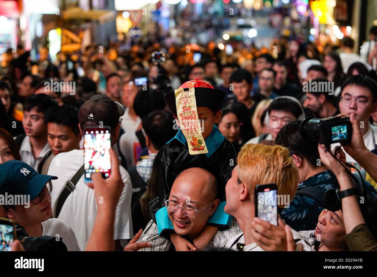 A boy dress as a chinese ghost at Lan Kwai Fong a popular bar district ...