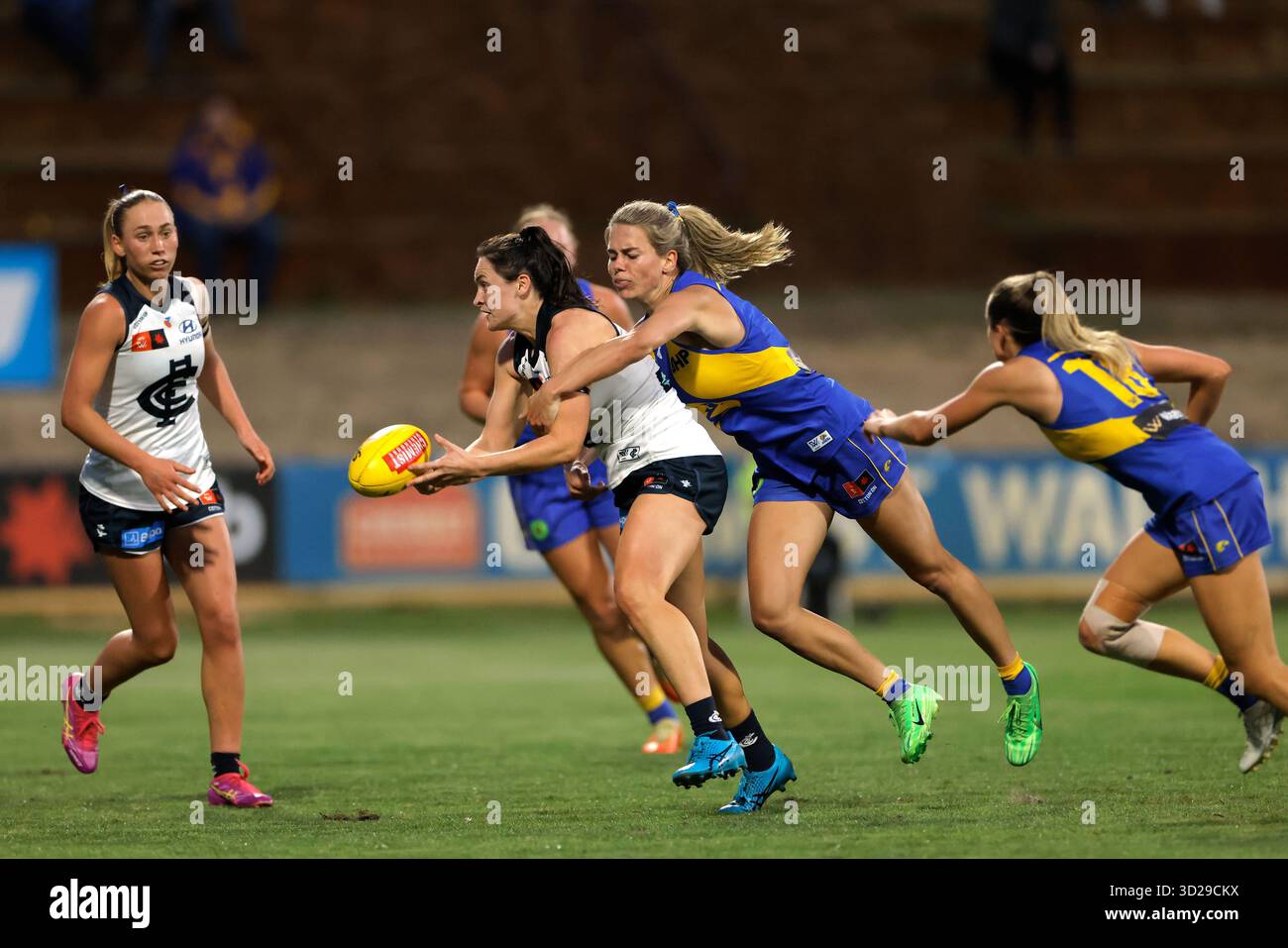 Erone Fitzpatrick of the Blues is tackled by Ella Roberts of the Eagles ...