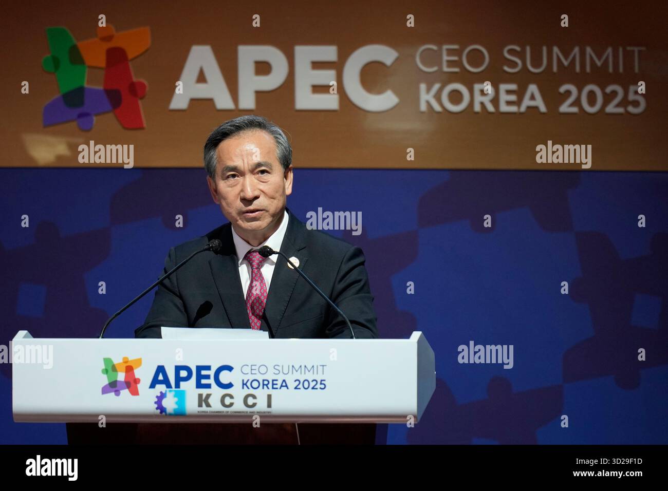 Ren Hongbin chair of the 2026 APEC CEO Summit China speaks during a handover ceremony at the end ...