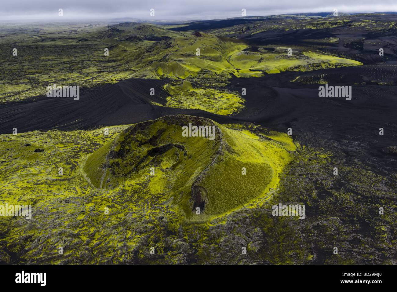 Aerial view of moss-covered volcanic cones create a surreal, alien ...