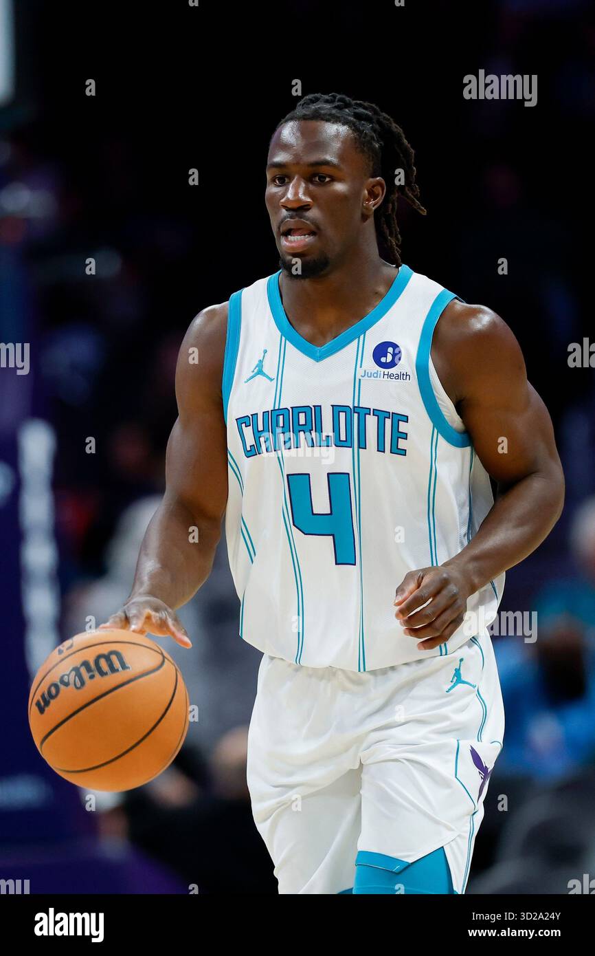 Charlotte Hornets guard Sion James brings the ball upcourt against the ...
