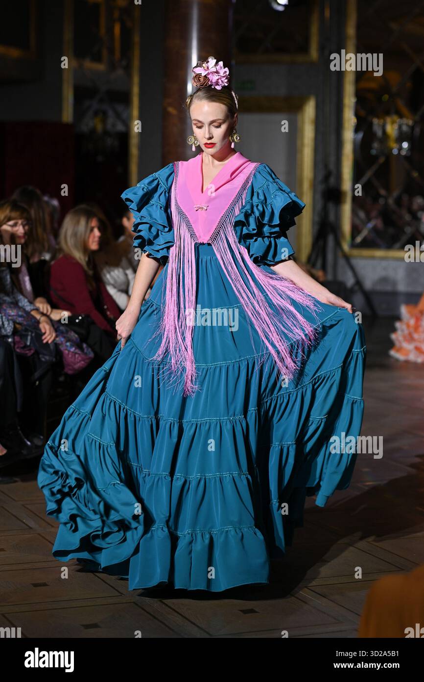 A model walks in a Amparo Pardal design at the International Flamenco ...