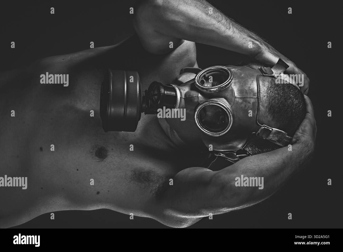 Doomsday. A man in a gas mask in the smoke. artistic background Stock ...