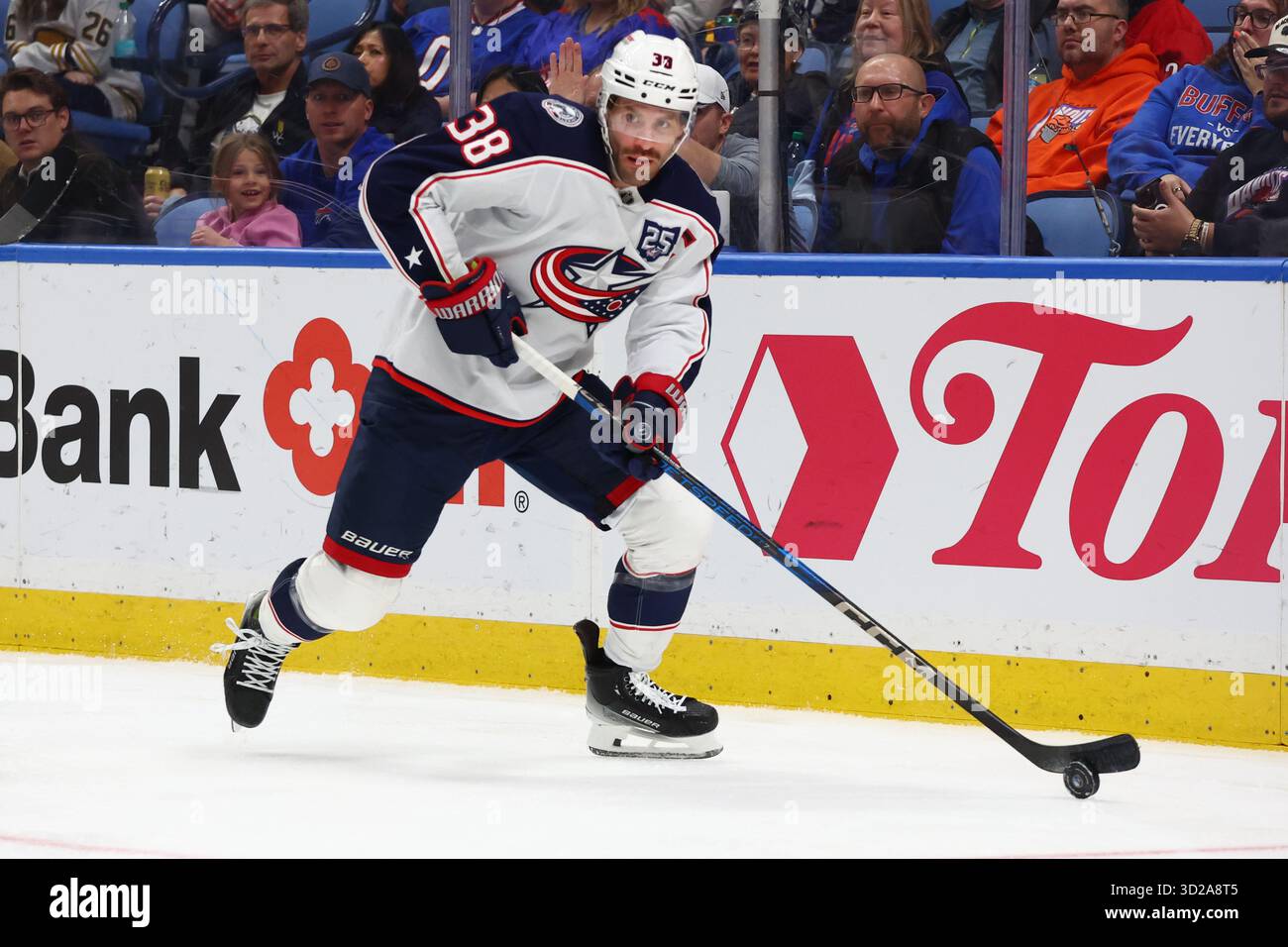 Columbus Blue Jackets center Boone Jenner (38) carries the puck during ...