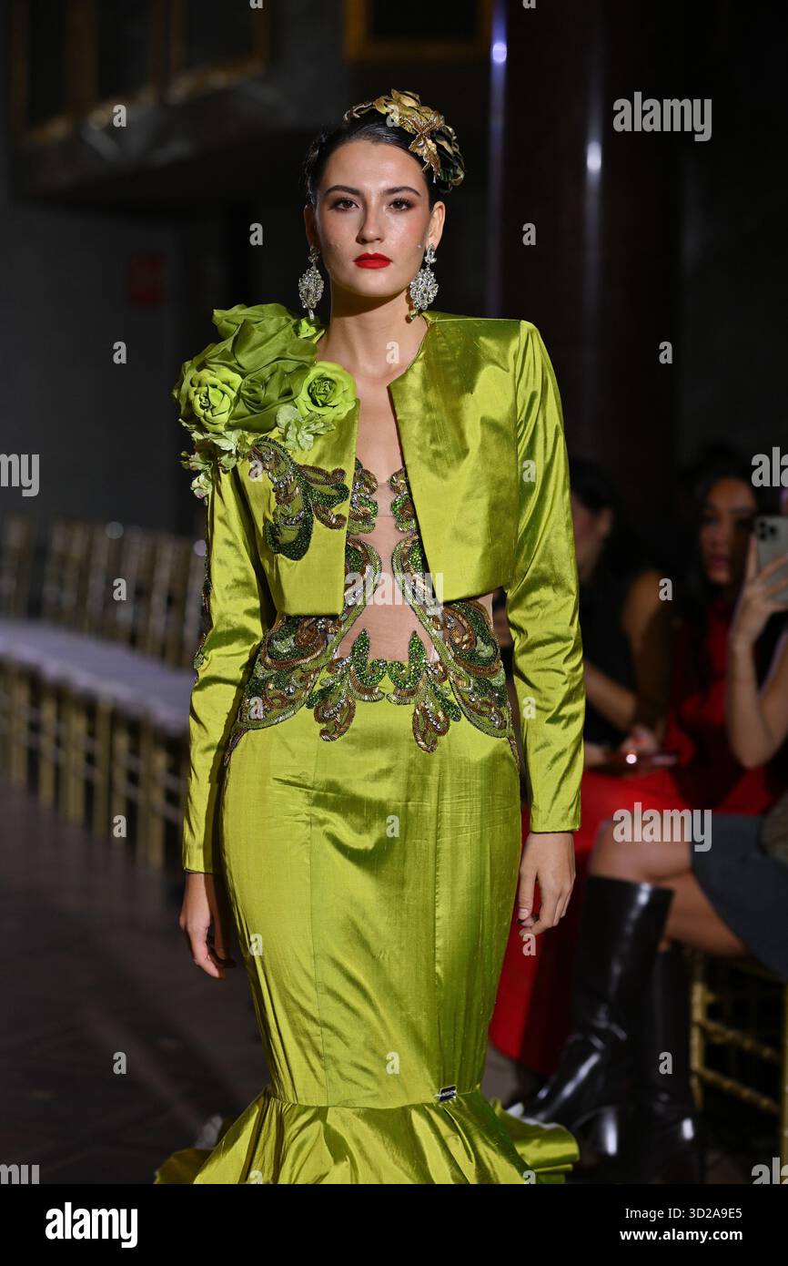 A model walks in a Amparo Pardal design at the International Flamenco ...