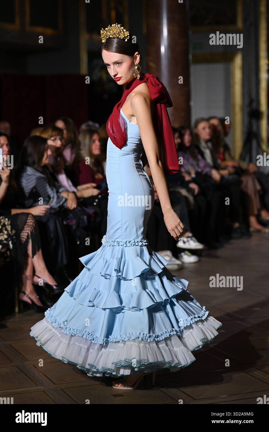 A model walks in a Amparo Pardal design at the International Flamenco ...