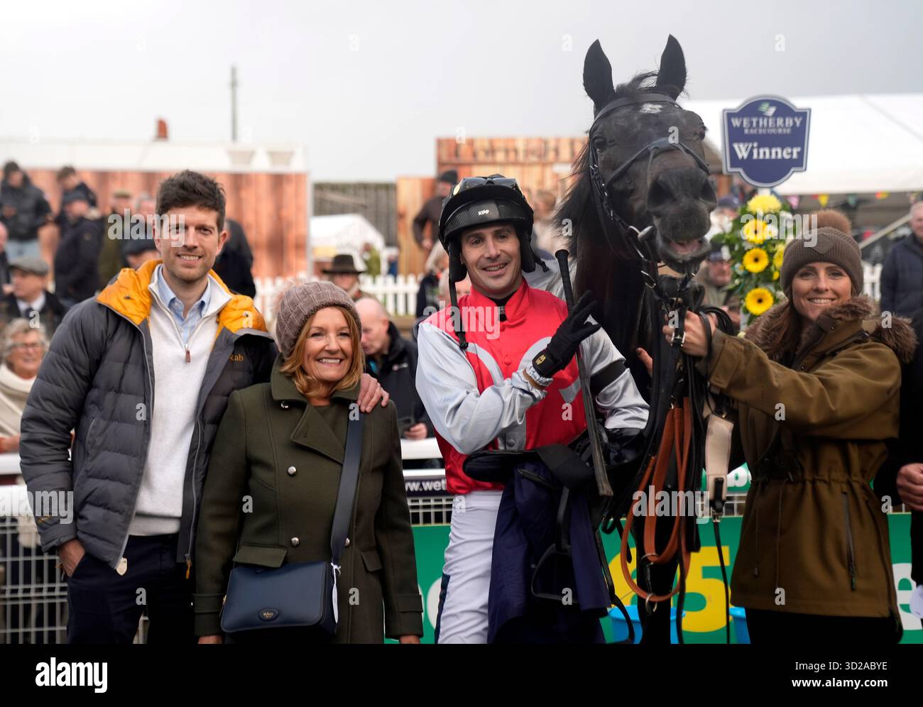 Minella Study and jockey Ryan Mania with trainer Adam Nicol (left ...
