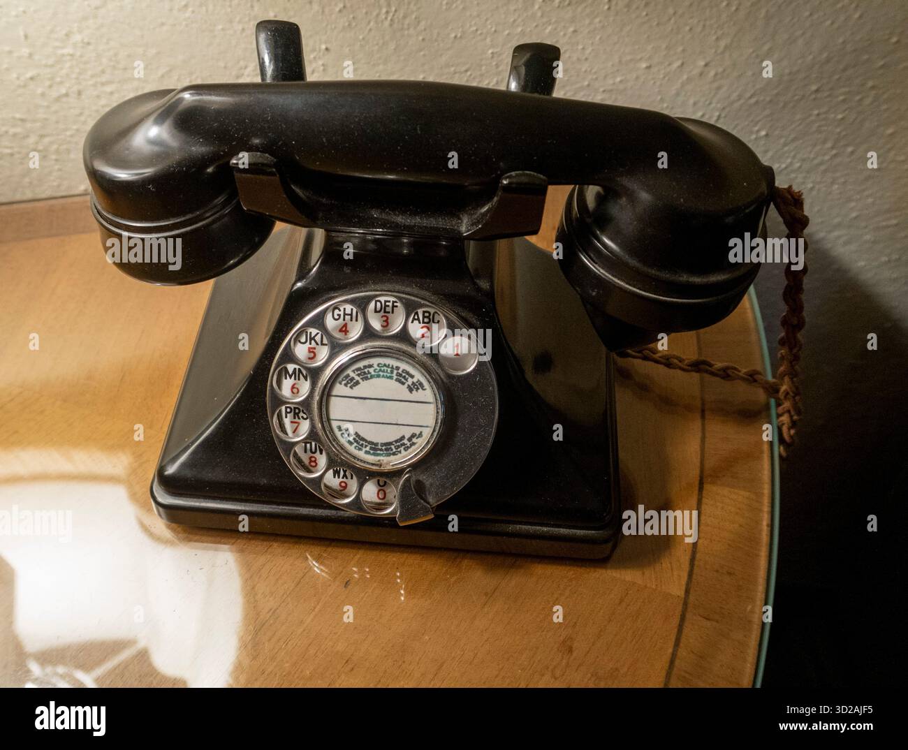 Old GPO post office telephone, black, bakelite, rotary dial with cord ...