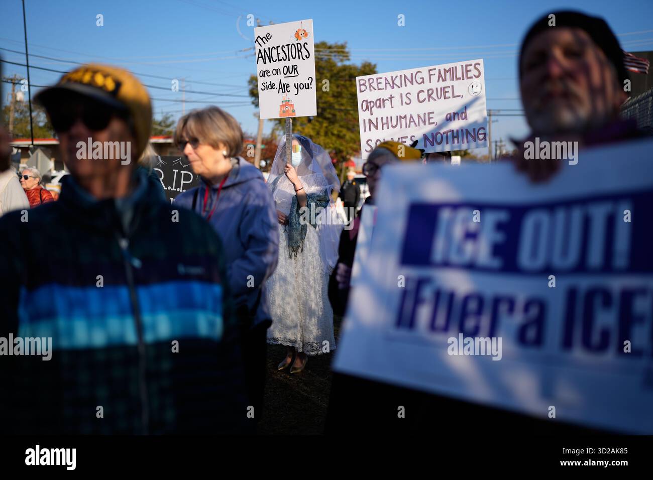 Protesters gather outside an ICE processing facility in the Chicago ...