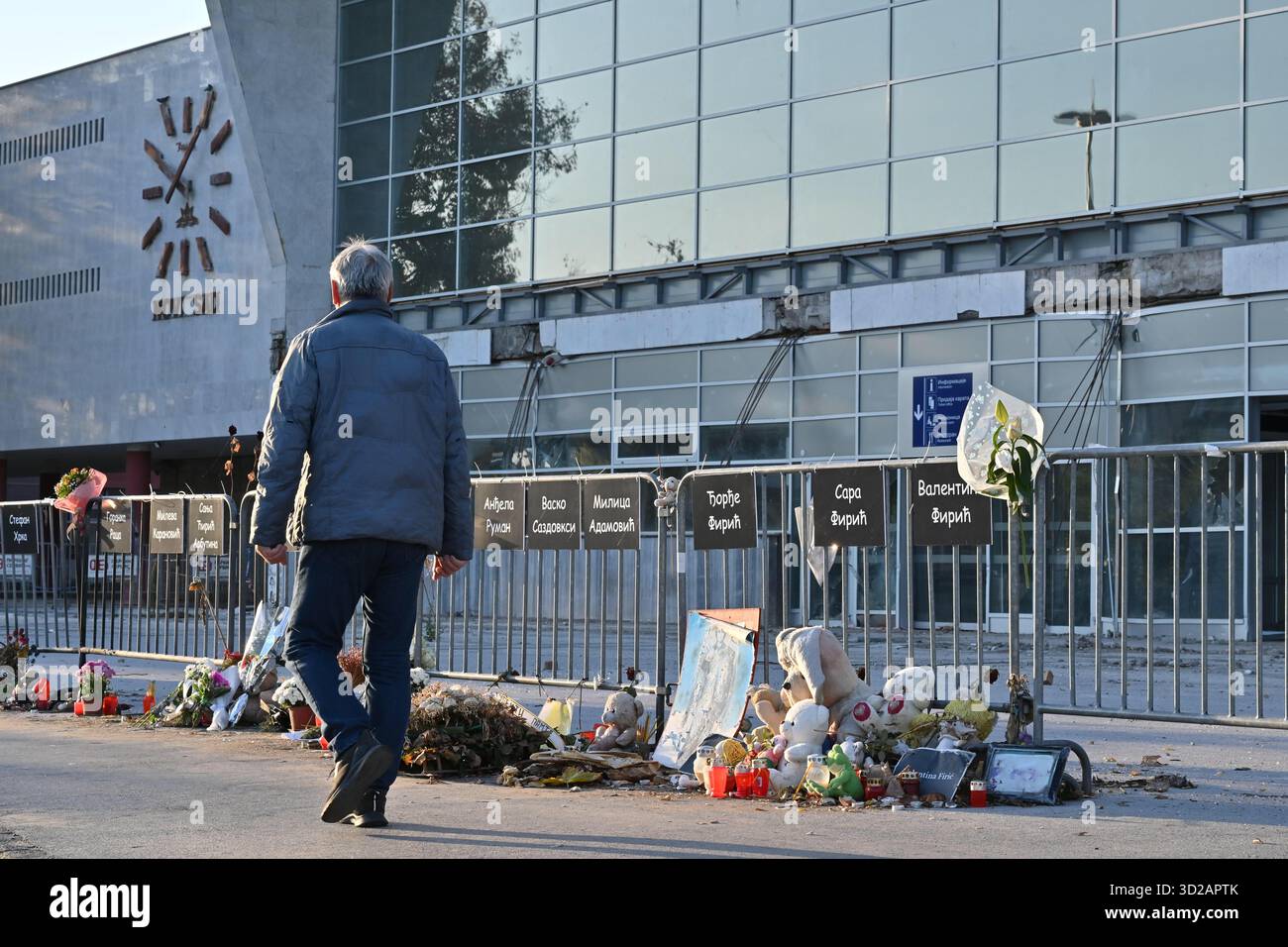 SERBIA, Novi Sad. 31 October 2025. Flowers and signs bearing the names ...