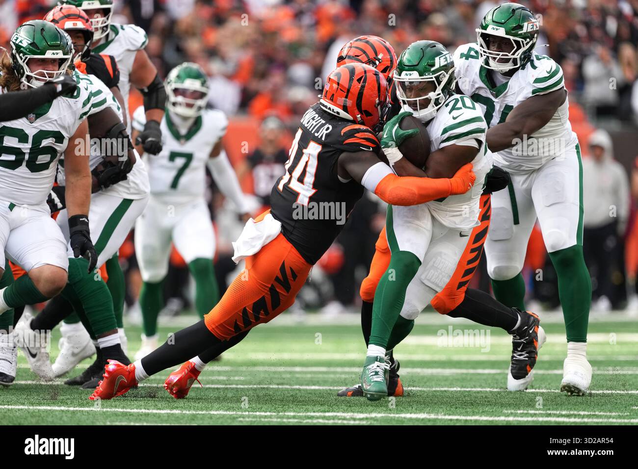 New York Jets running back Breece Hall (20) carries the ball as ...