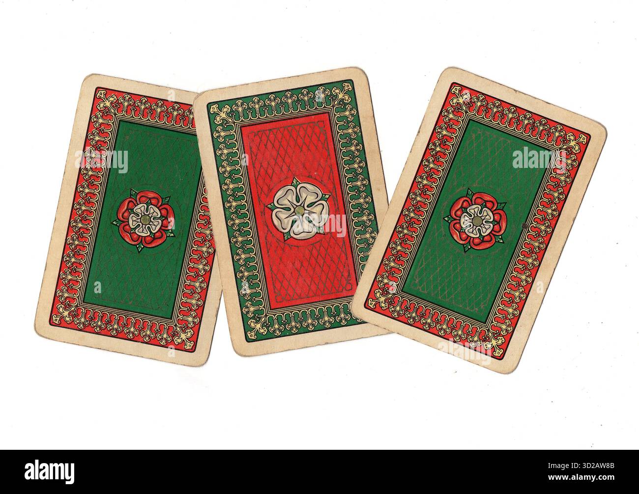 A hand of vintage playing card backs with one card in a different ...