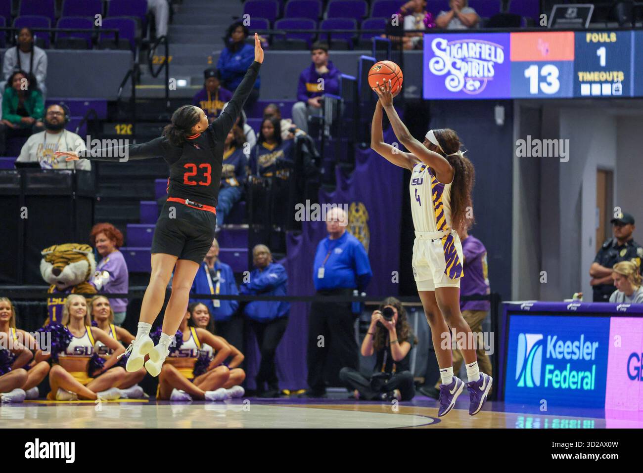 LSU Tigers guard Flau'Jae Johnson (4) shoots a three-pointer over ...