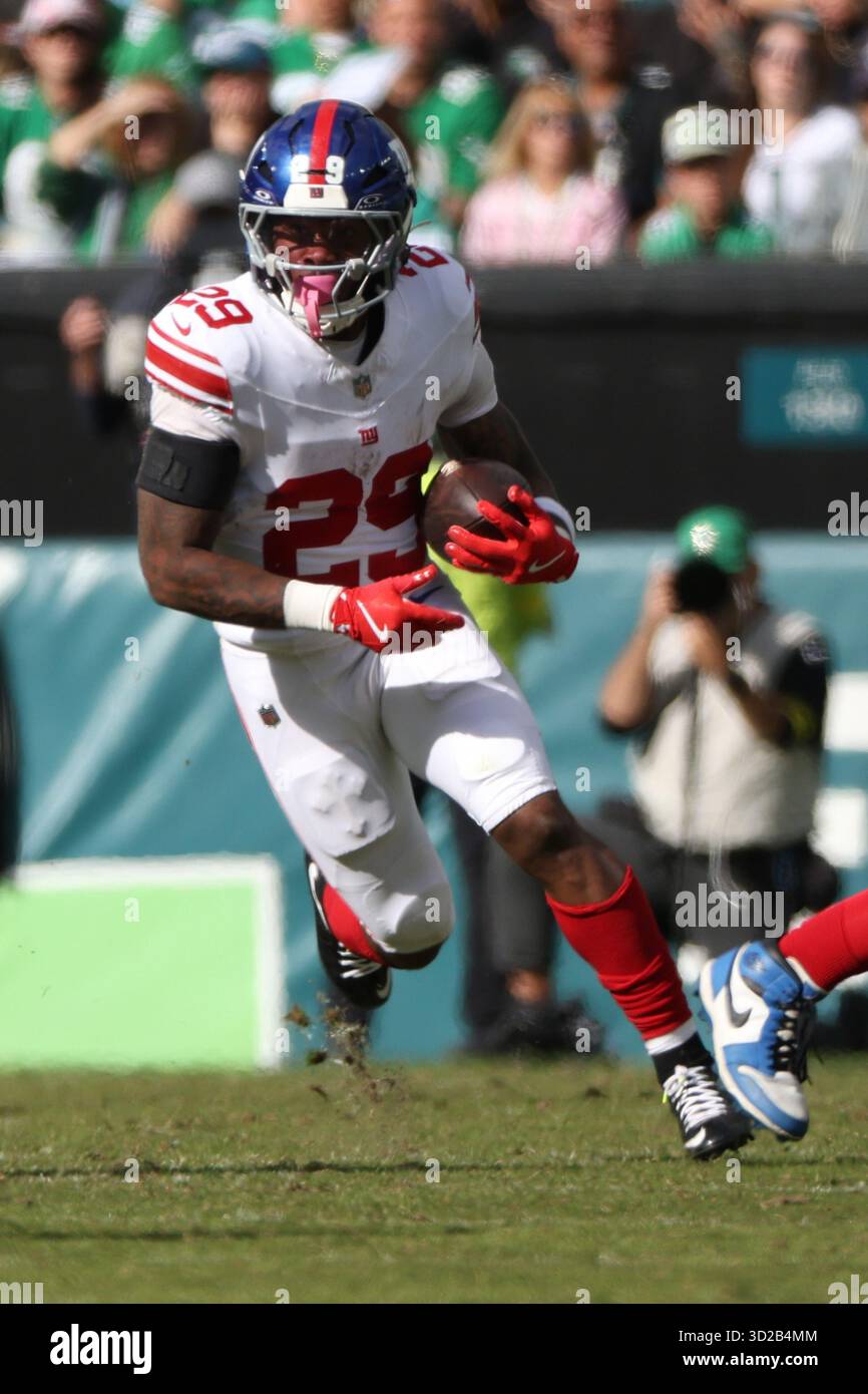 New York Giants running back Tyrone Tracy Jr. (29) runs with the ball ...
