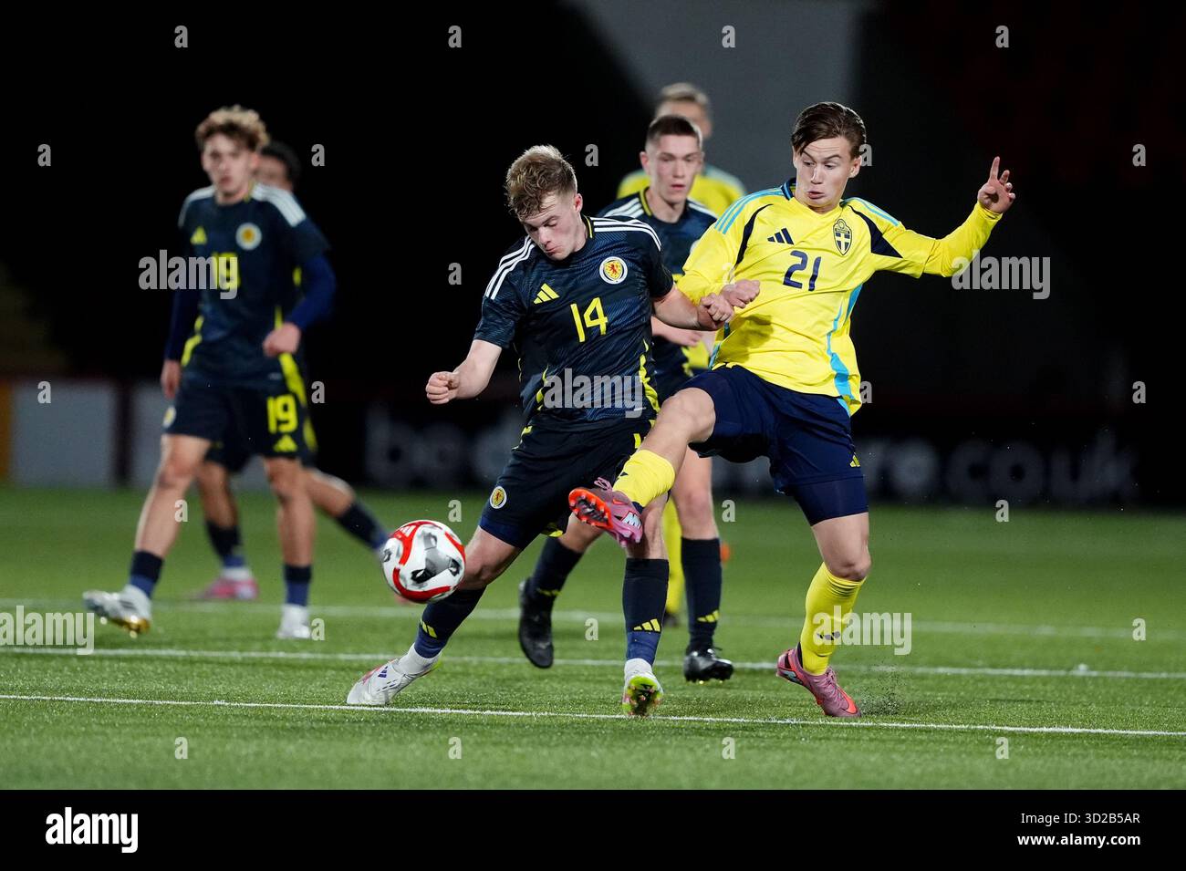 Scotland's Ethan Crombie (centre left) and Sweden's Alexander Andersson ...
