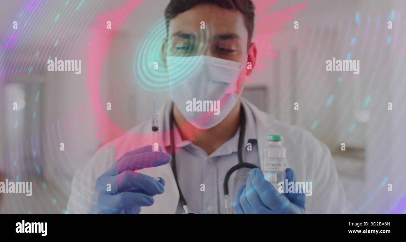 Medical doctor wearing lab coat preparing vaccine in treatment room ...