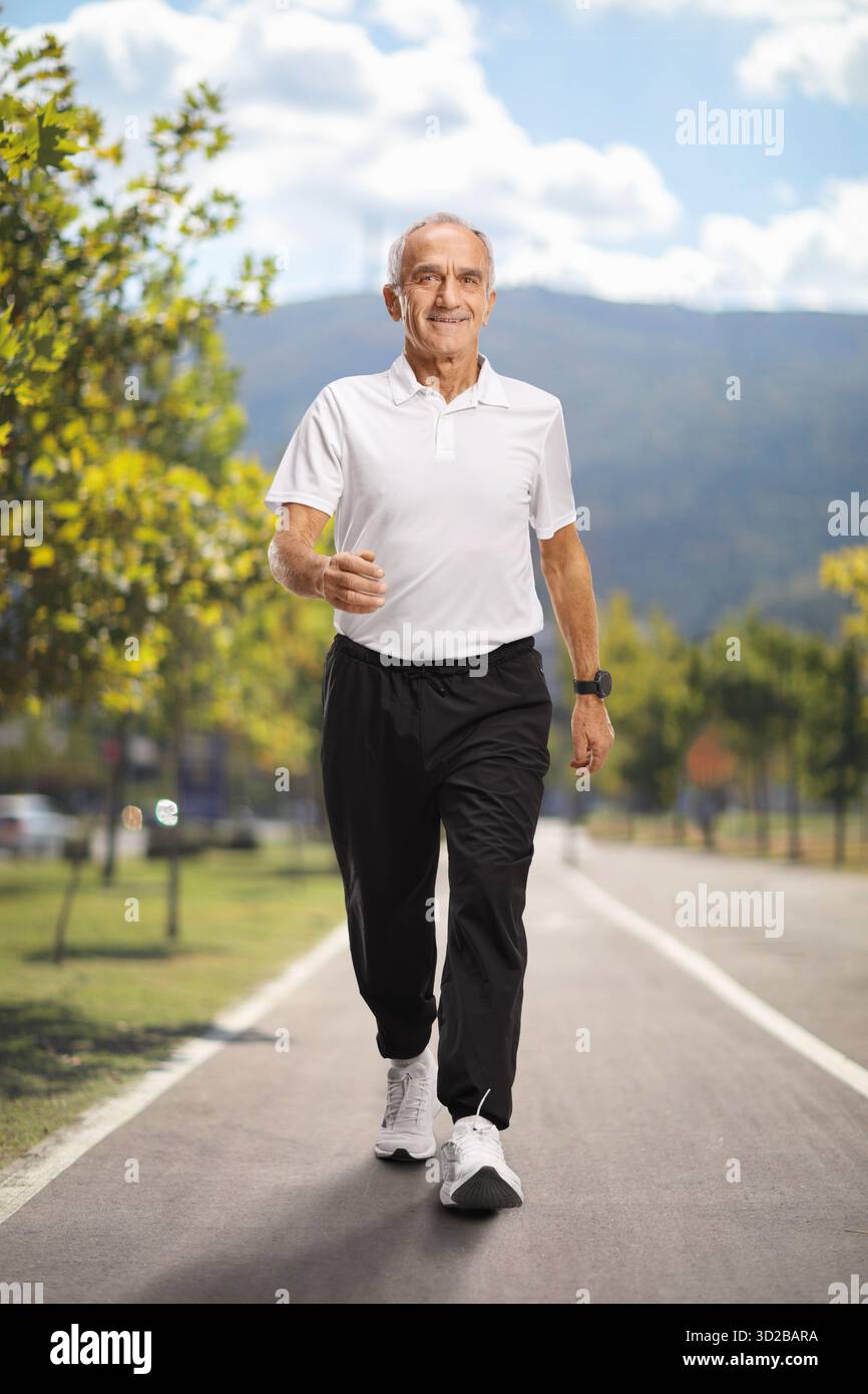 Mature man training walking hi-res stock photography and images - Alamy