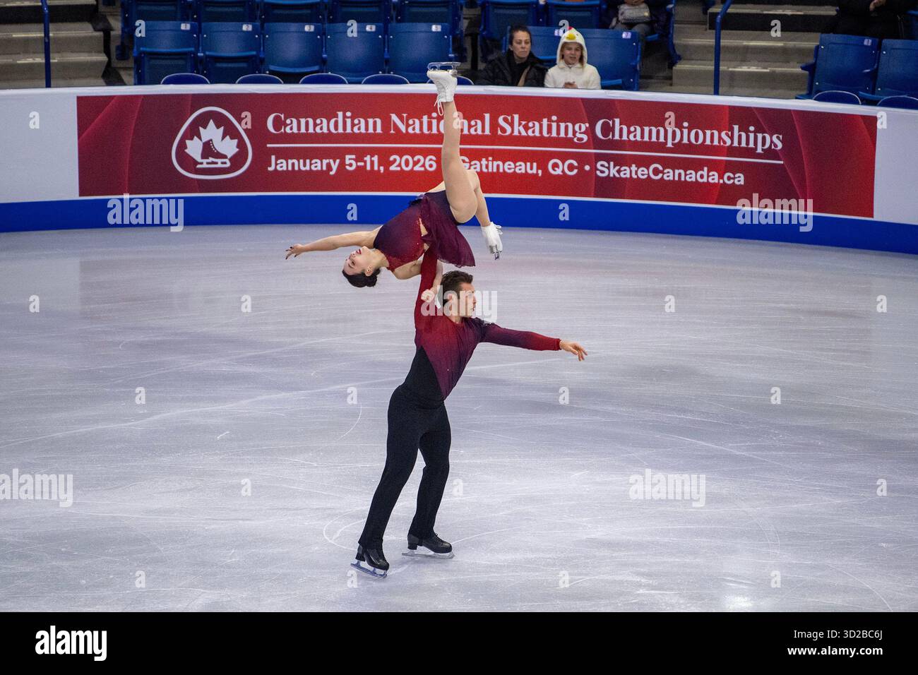 Canada's Lia Pereira and Trennt Michaud skate during practice at the ...