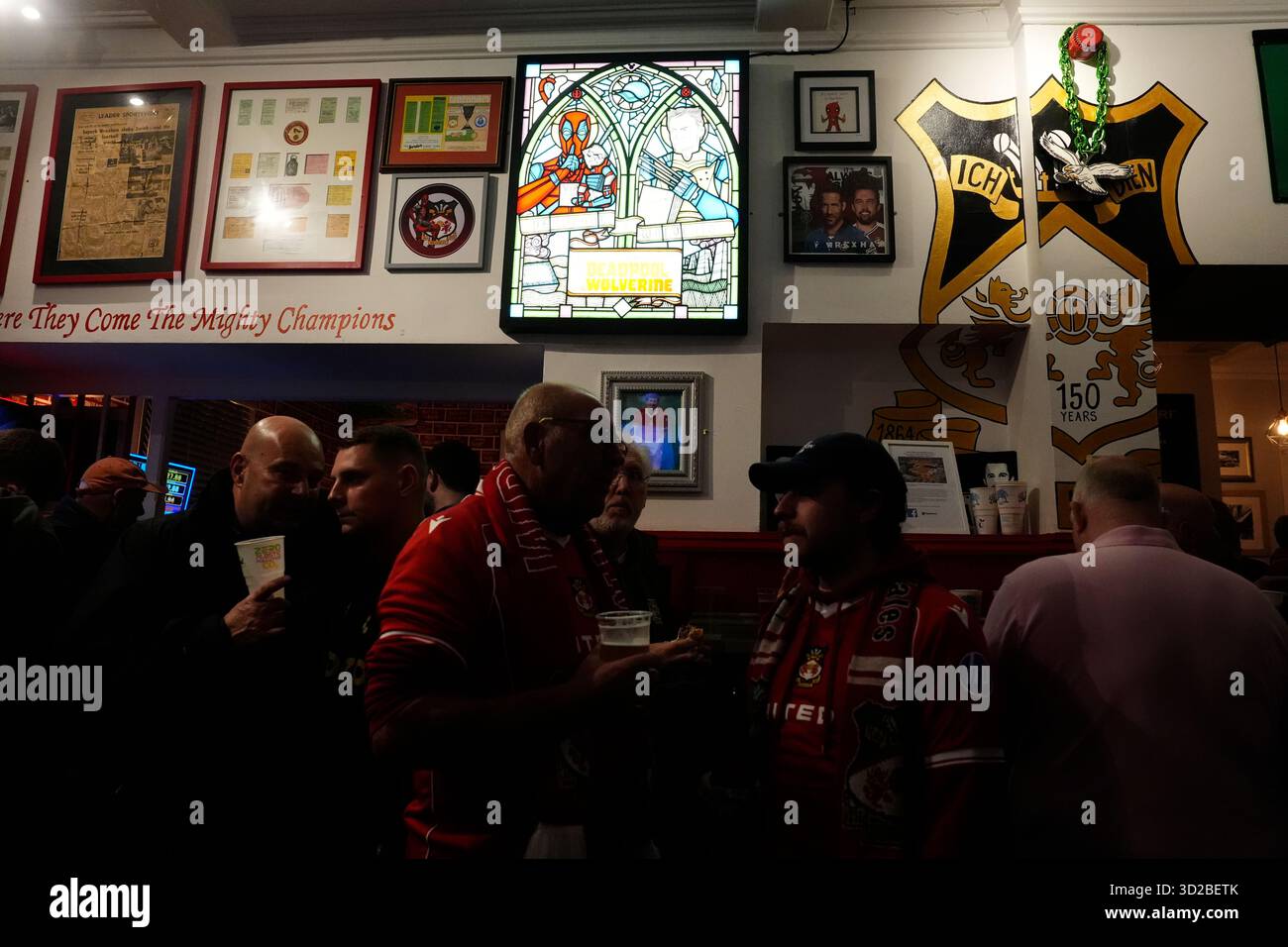 Wrexham fans in the The Turf before the Sky Bet Championship match at the SToL Racecourse ...