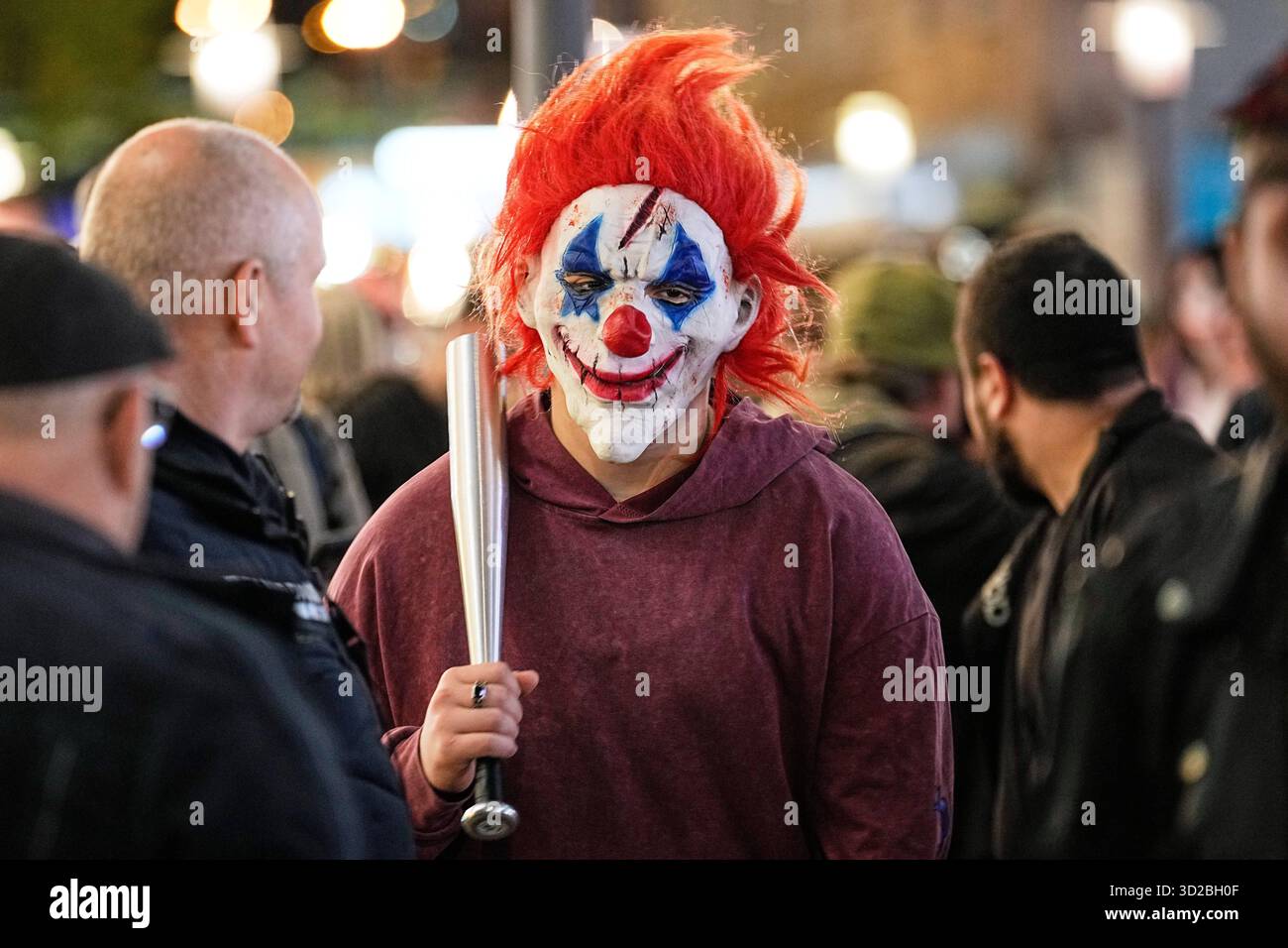 People dressed up in scary costumes take part in a Halloween Zombie ...