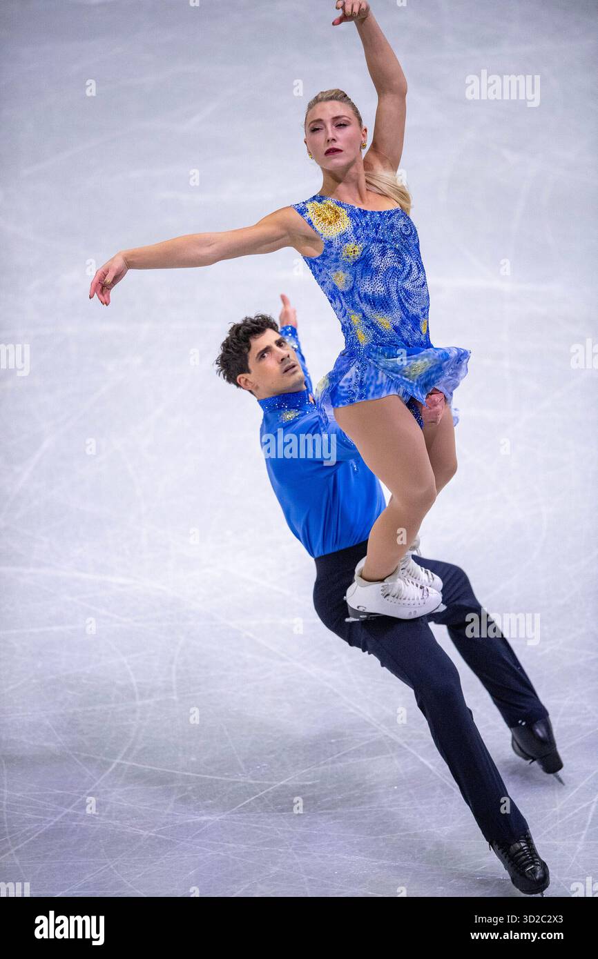 Canada's Piper Gilles and Paul Poirier skate during a practice for the ...
