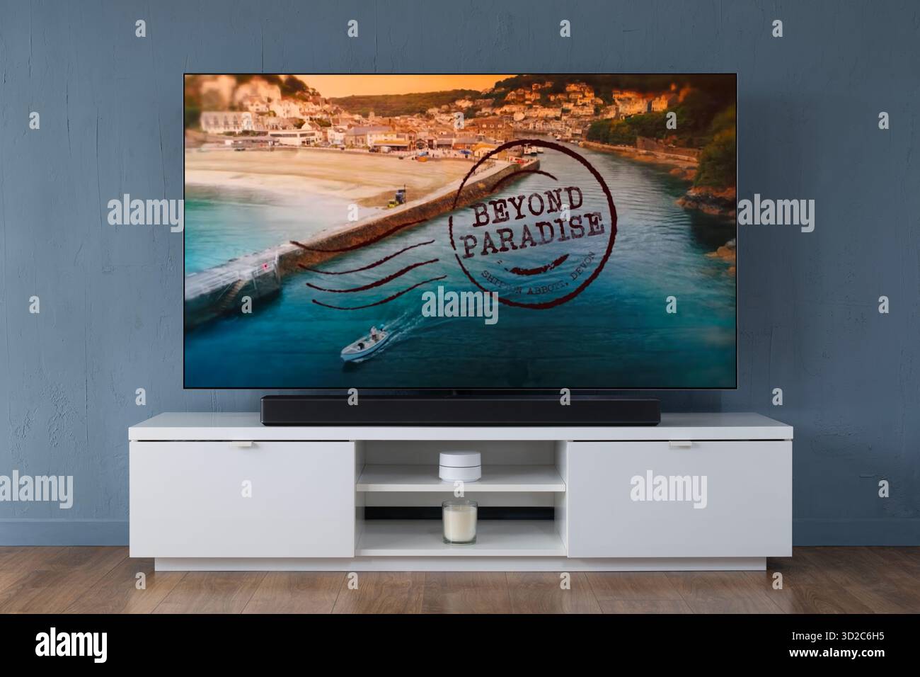 A widescreen OLED television showing the intro scene to the TV series ...