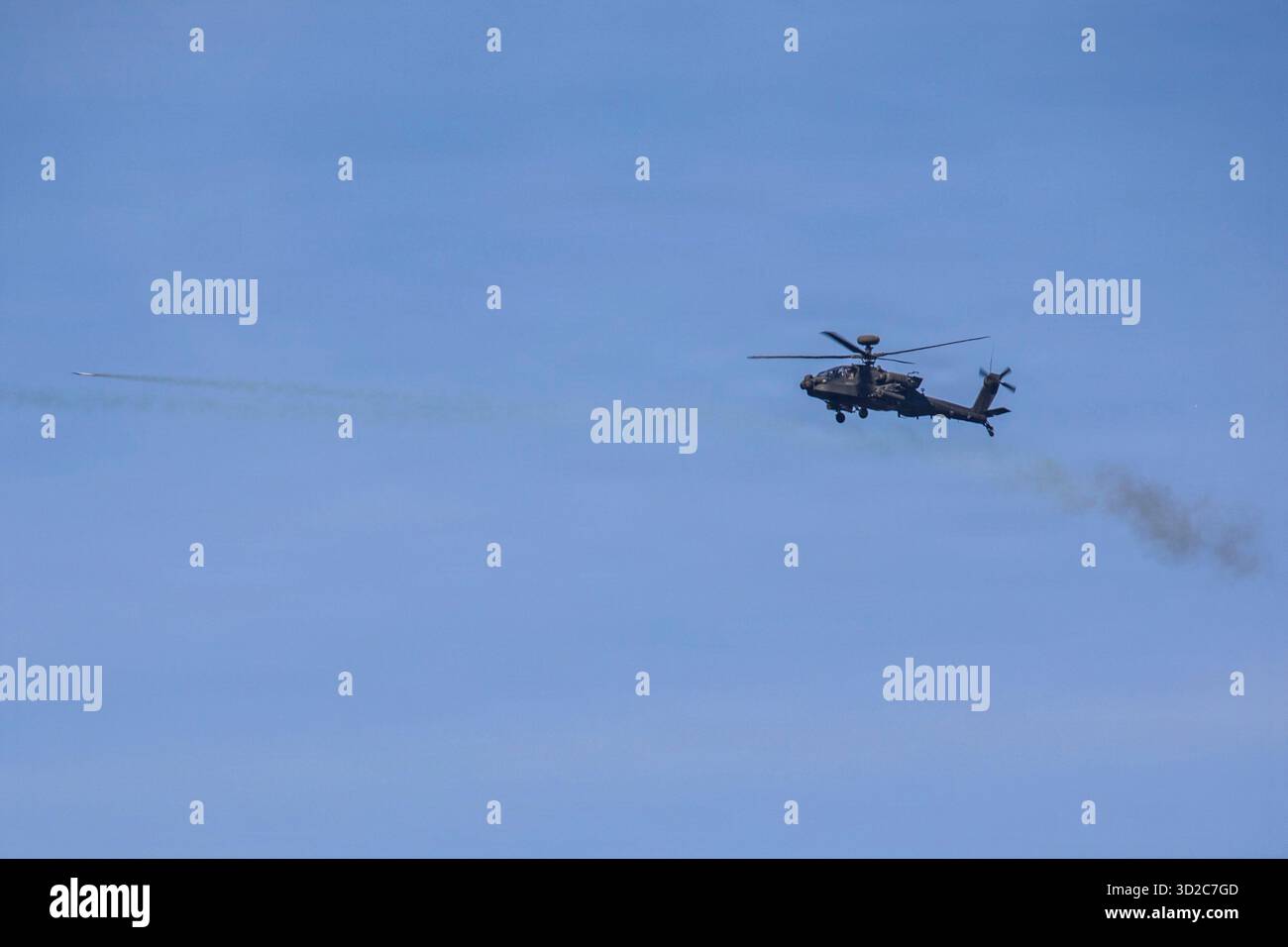 An AH-64 Apache helicopter, assigned to 3rd Squadron, 17th Cavalry ...
