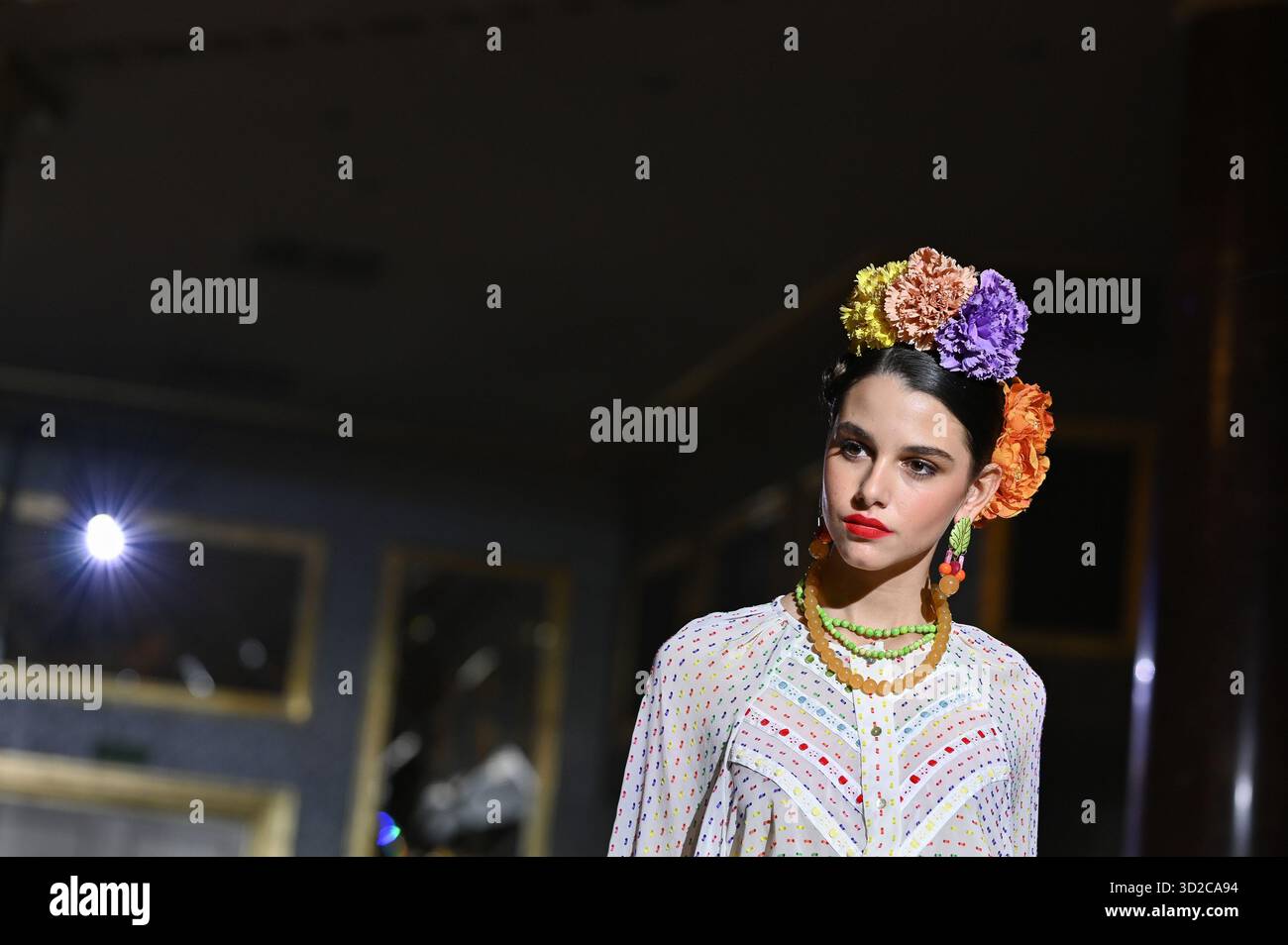 A model walks in a Angela Isa design at the International Flamenco ...