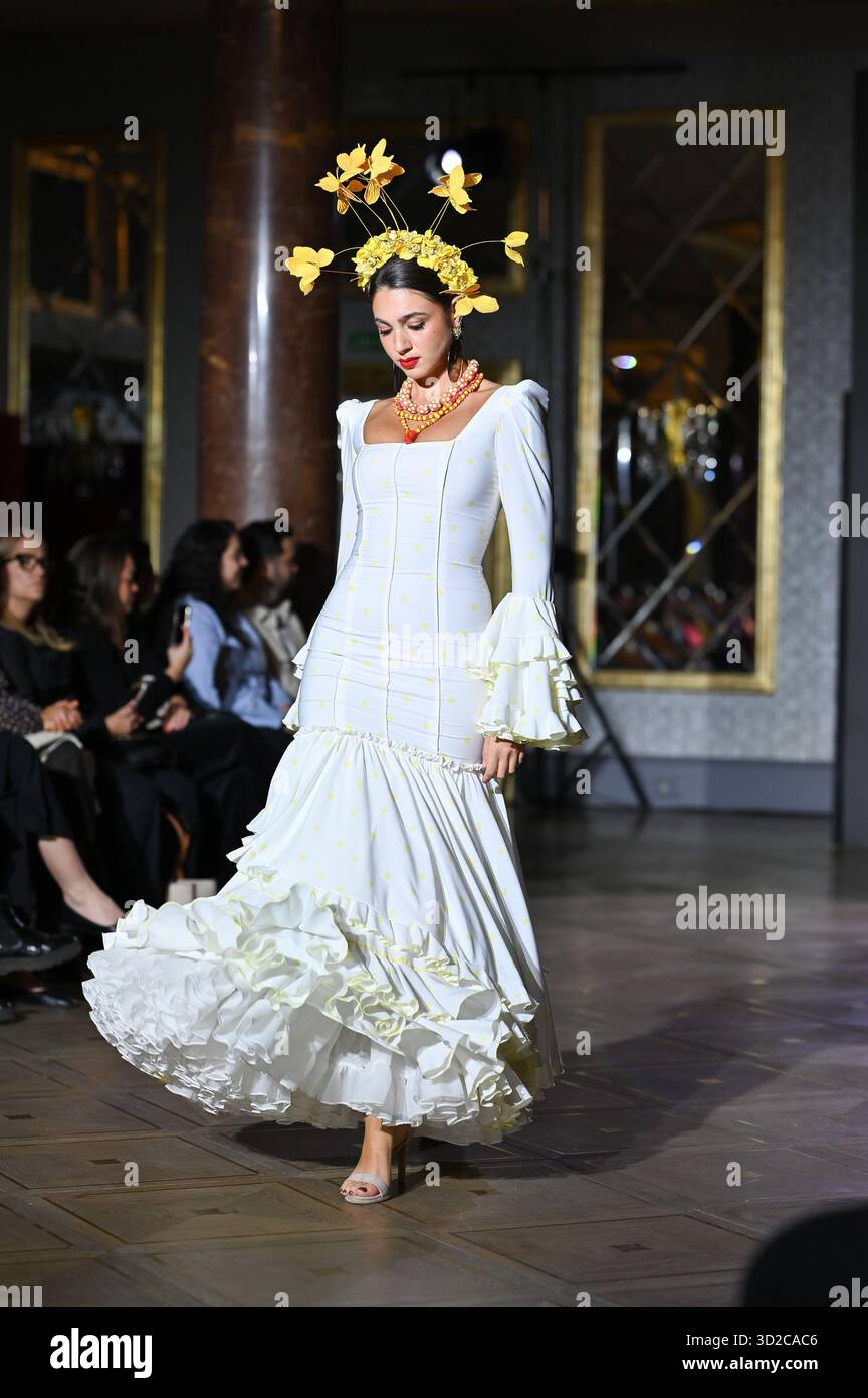 A model walks in a Angela Isa design at the International Flamenco ...