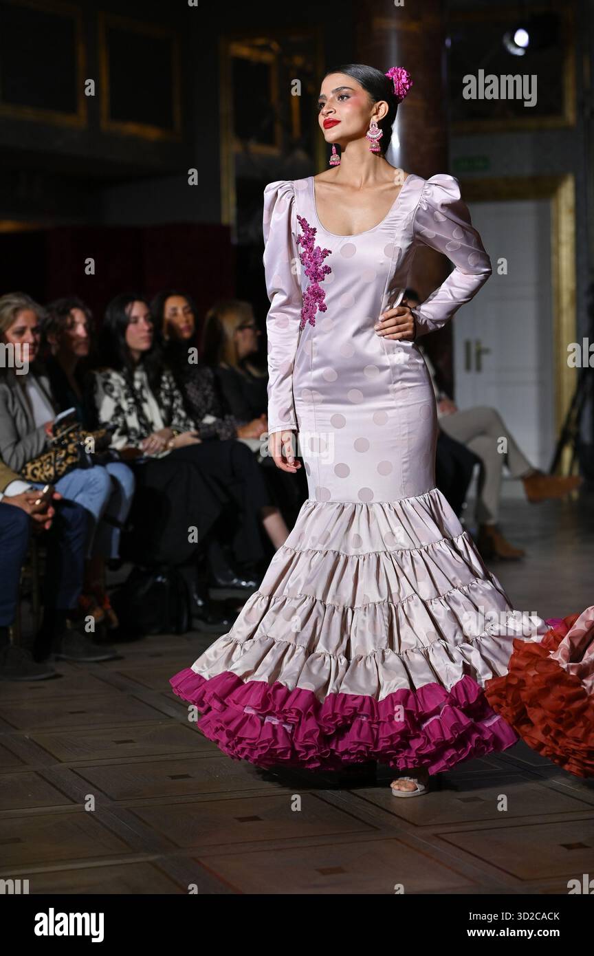 A model walks in a Angela Isa design at the International Flamenco ...
