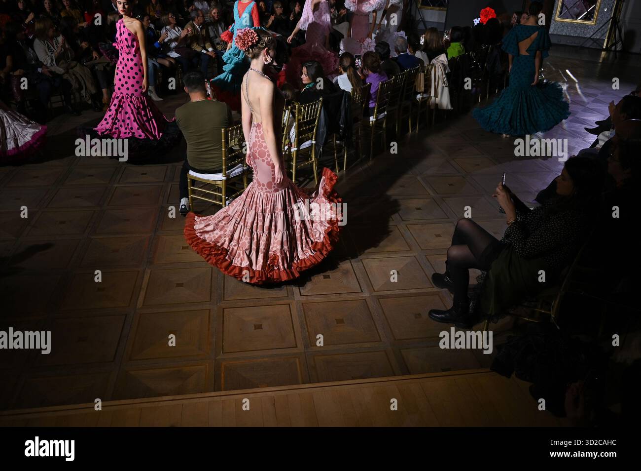 A model walks in a Angela Isa design at the International Flamenco ...