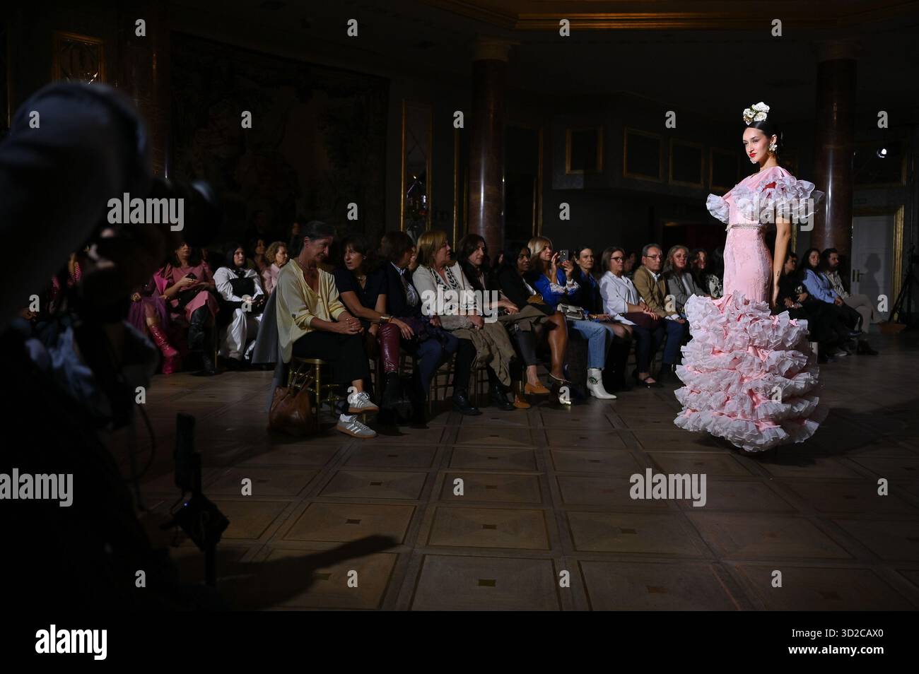 A model walks in a Angela Isa design at the International Flamenco ...