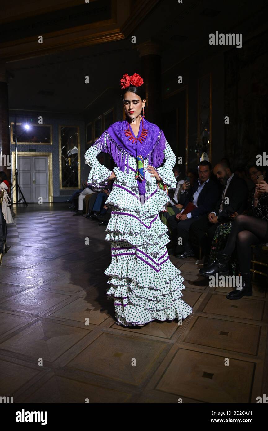 A model walks in a Angela Isa design at the International Flamenco ...